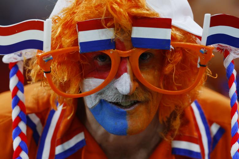 Faces of the World Cup: football fans across the globe show their ...