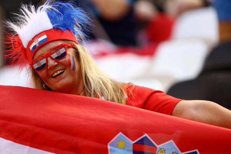 Faces of the World Cup: football fans across the globe show their ...