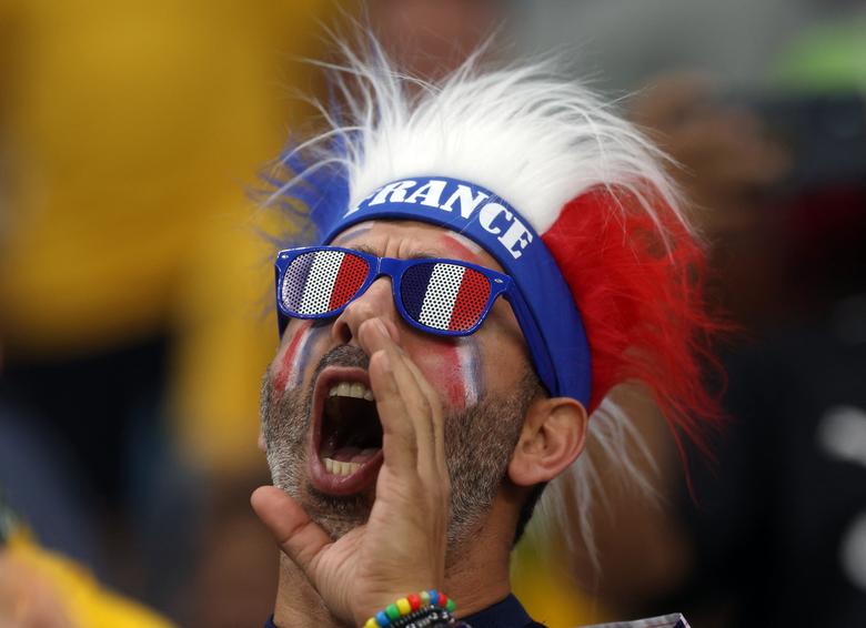 Faces of the World Cup: football fans across the globe show their ...