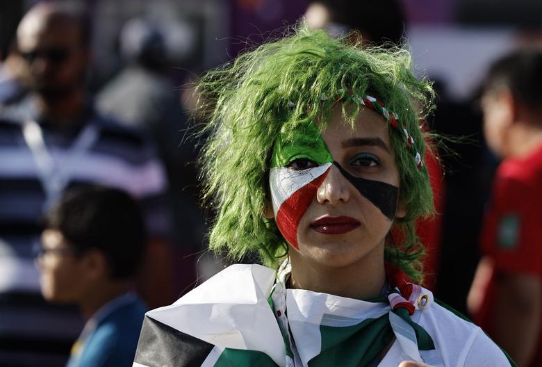 Faces of the World Cup: football fans across the globe show their ...